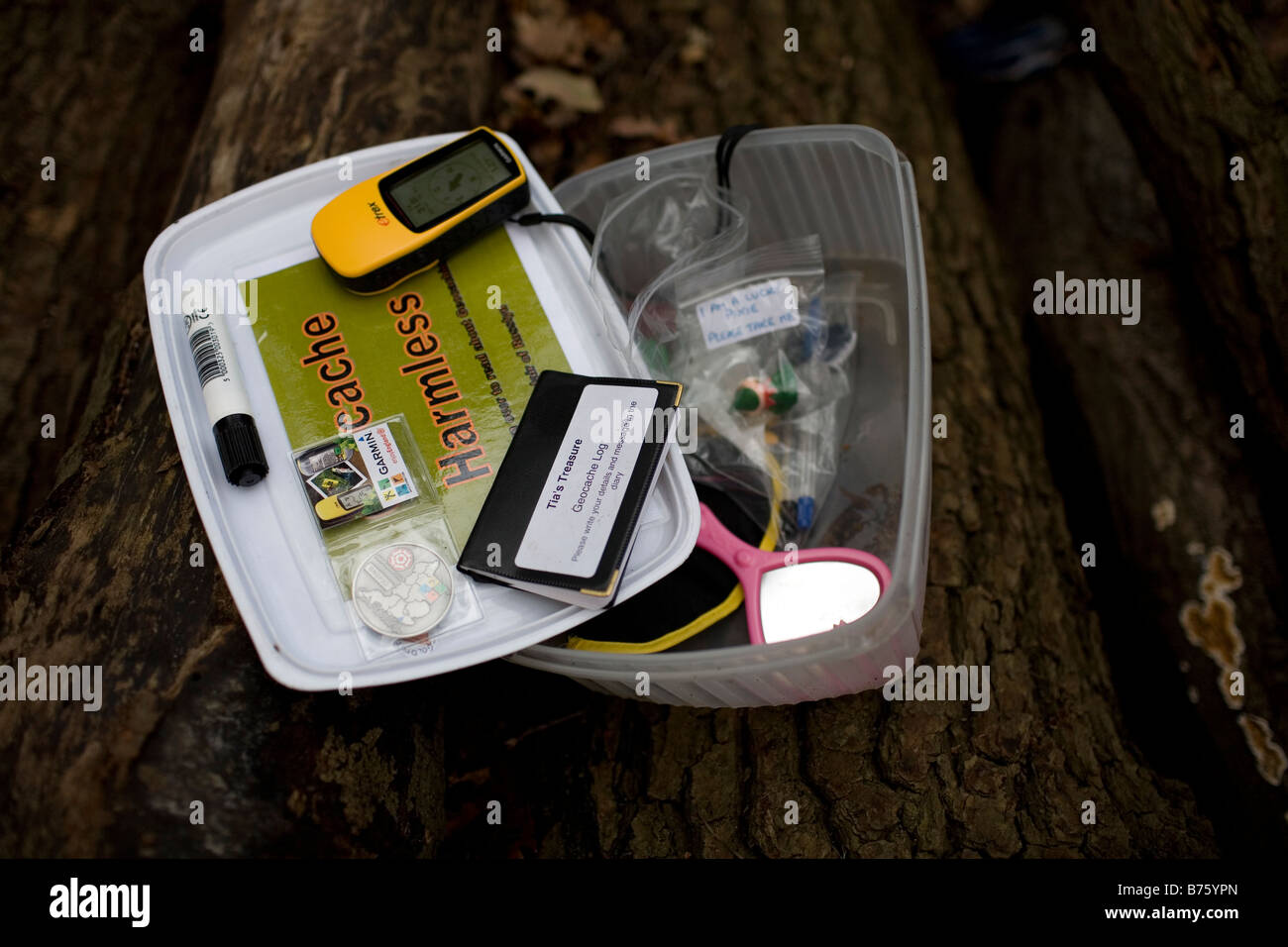 Open geocache box showing contents hi-res stock photography and images ...