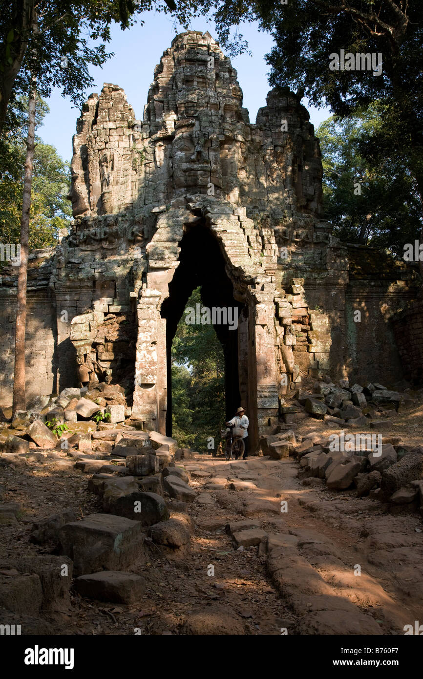 Angkor Wat, Bayon Gate, man with bicycle, Siem Reap Cambodia Stock ...