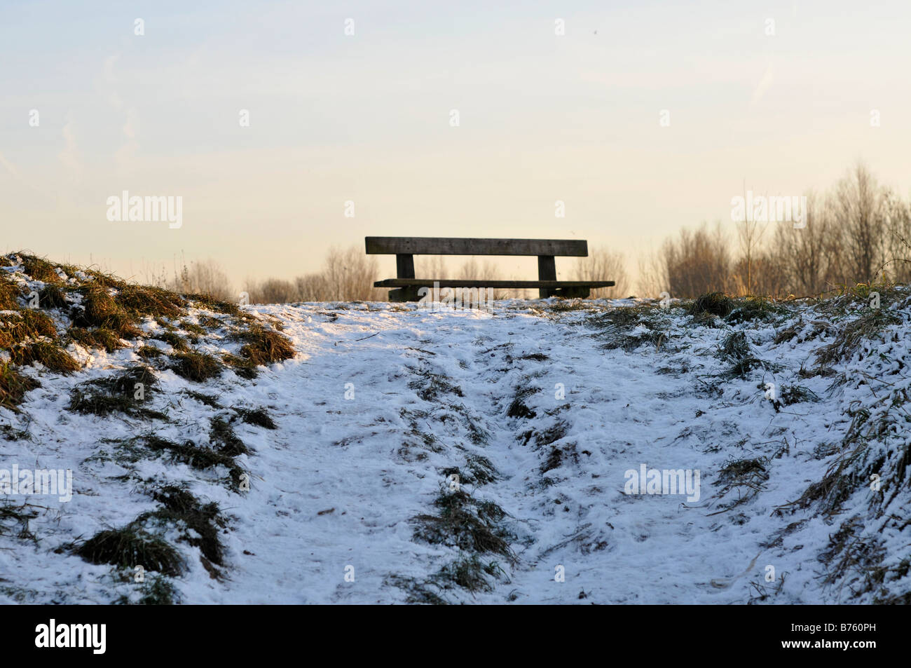 empty seat covered with snow in winter Stock Photo - Alamy