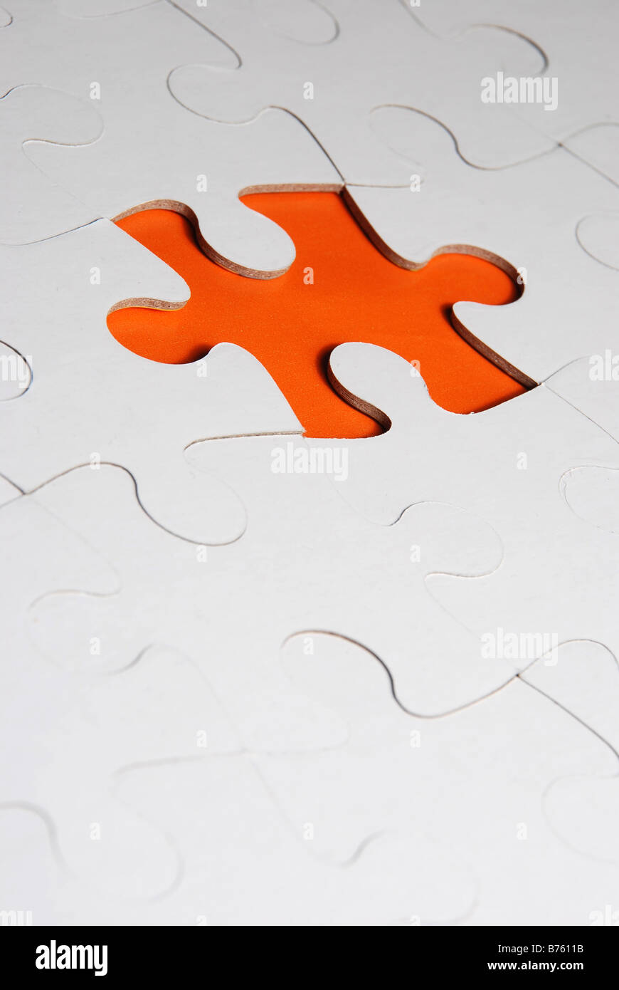 abstract puzzle background with one missing piece Stock Photo - Alamy