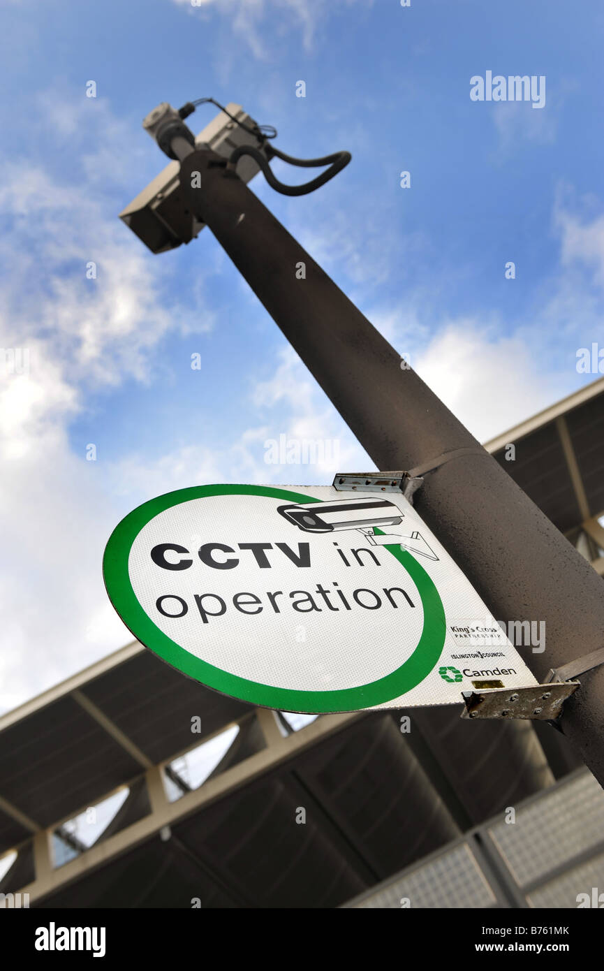 CCTV, Camera on post and sighn London Stock Photo - Alamy