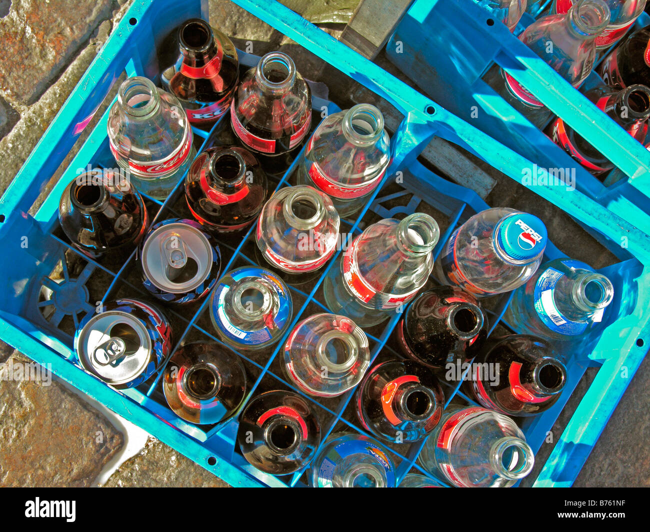 crate with empty bottles of Coca Cola and Pepsi Stock Photo - Alamy