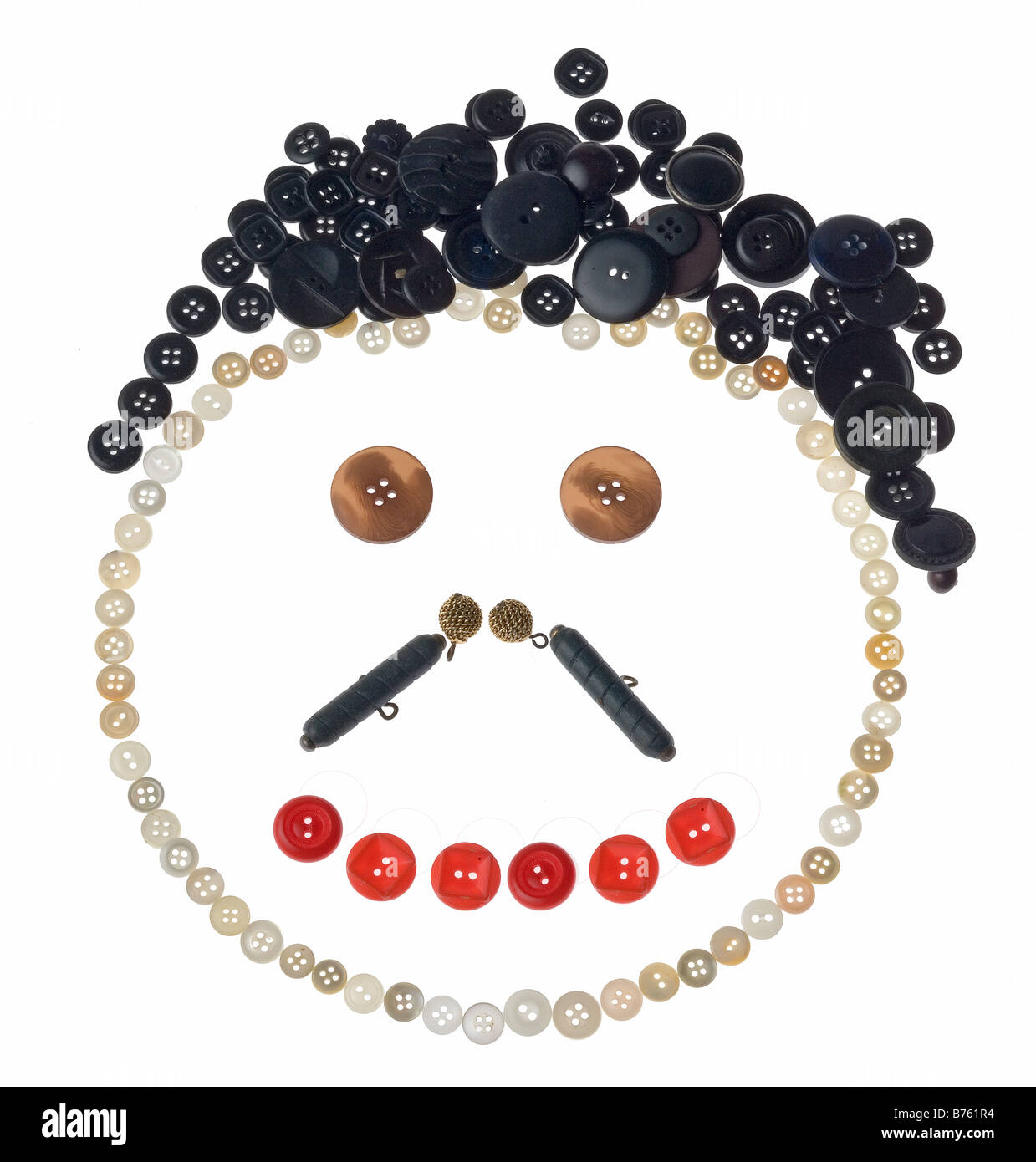 Happy Face made from antique buttons Stock Photo - Alamy