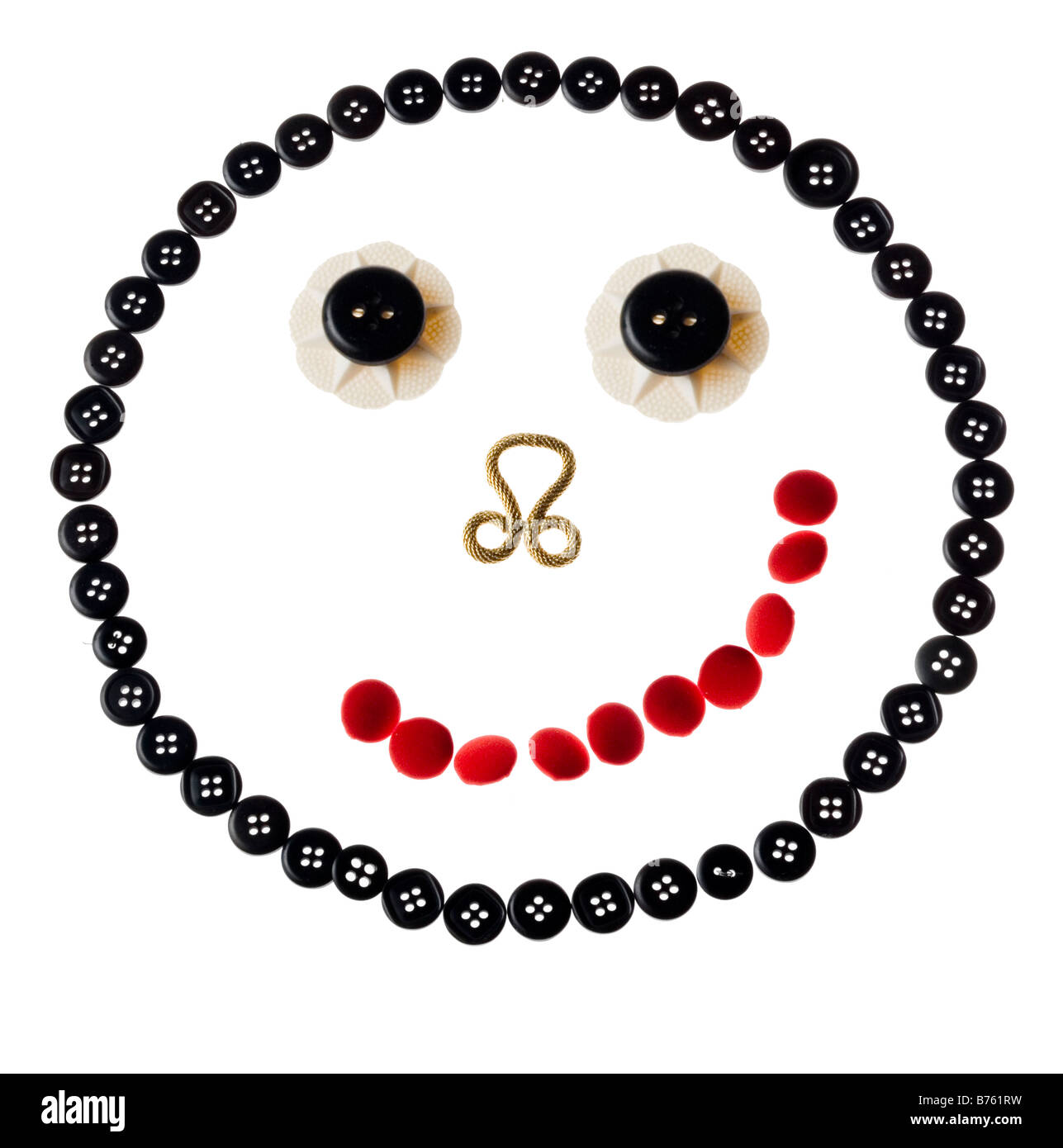 Happy Face made from antique buttons Stock Photo - Alamy