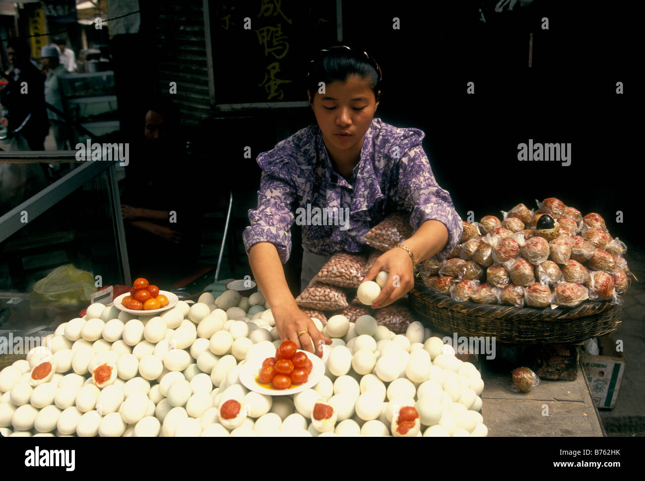 Egg vendor female egg seller female hi-res stock photography and images ...