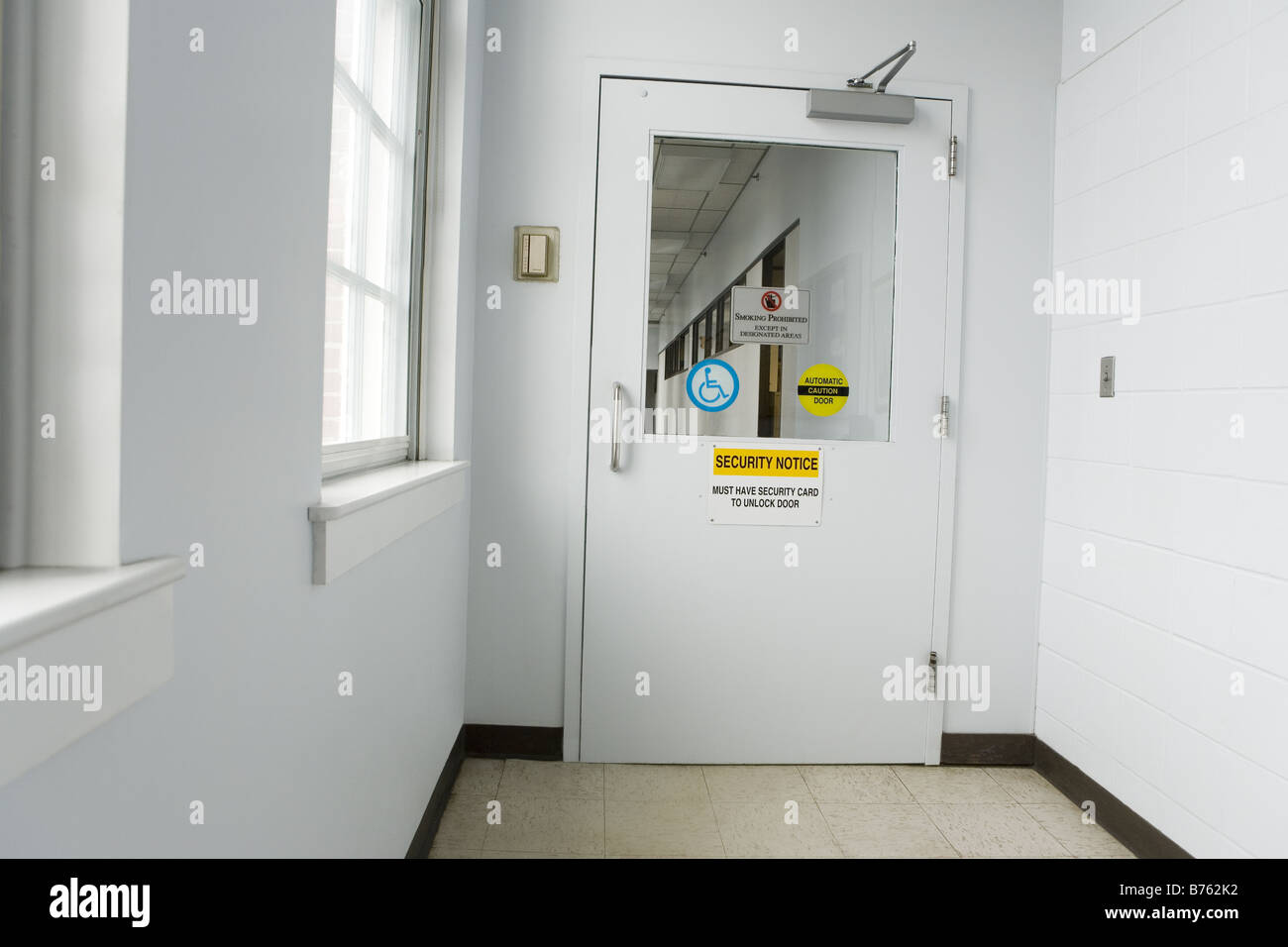 Information signs on a door Stock Photo - Alamy