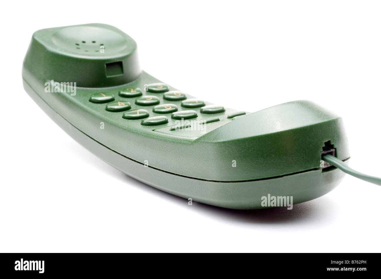 Green telephone handset with bt431a socket and lead Stock Photo - Alamy