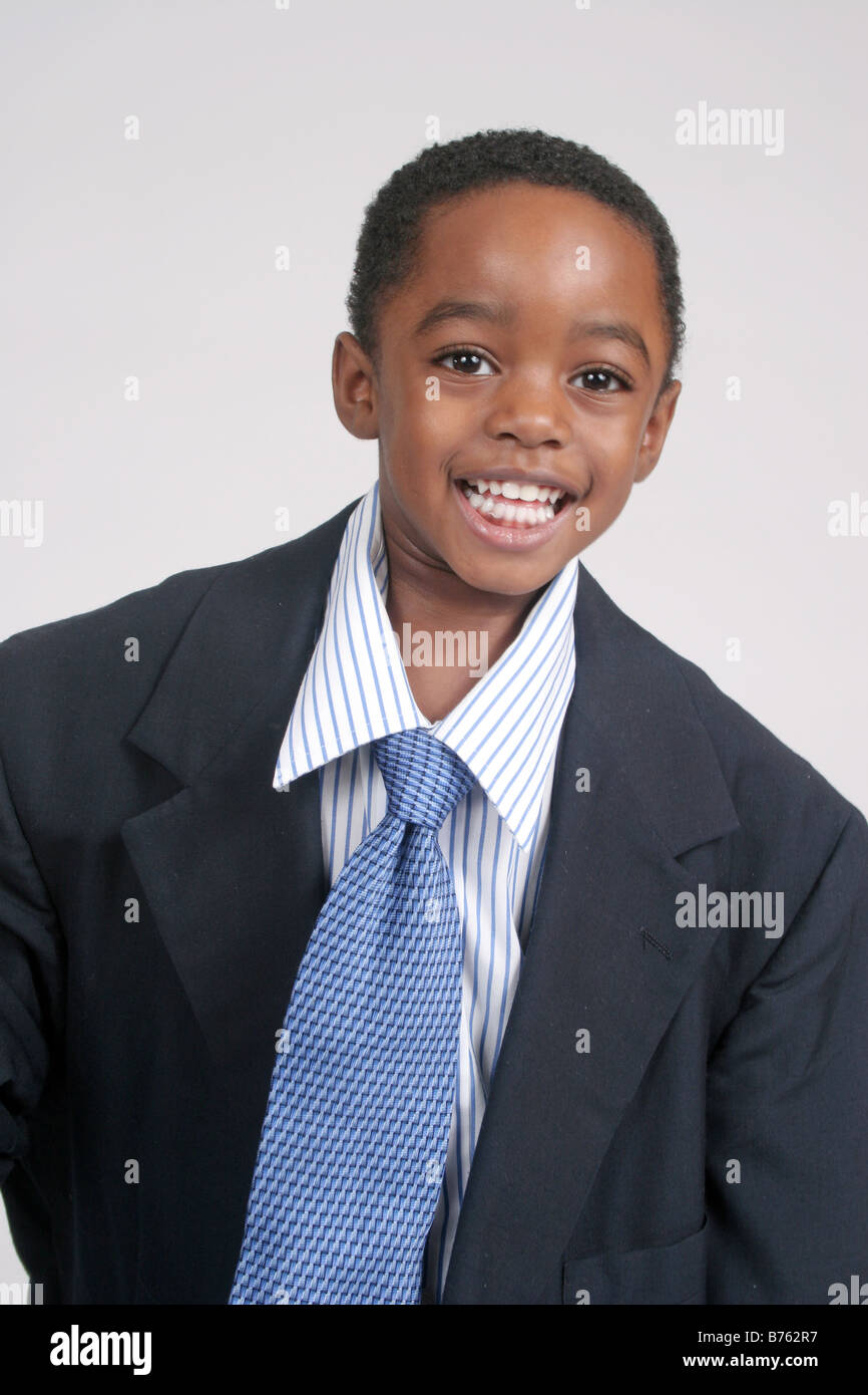 Wearing his fathers business cloths Stock Photo - Alamy