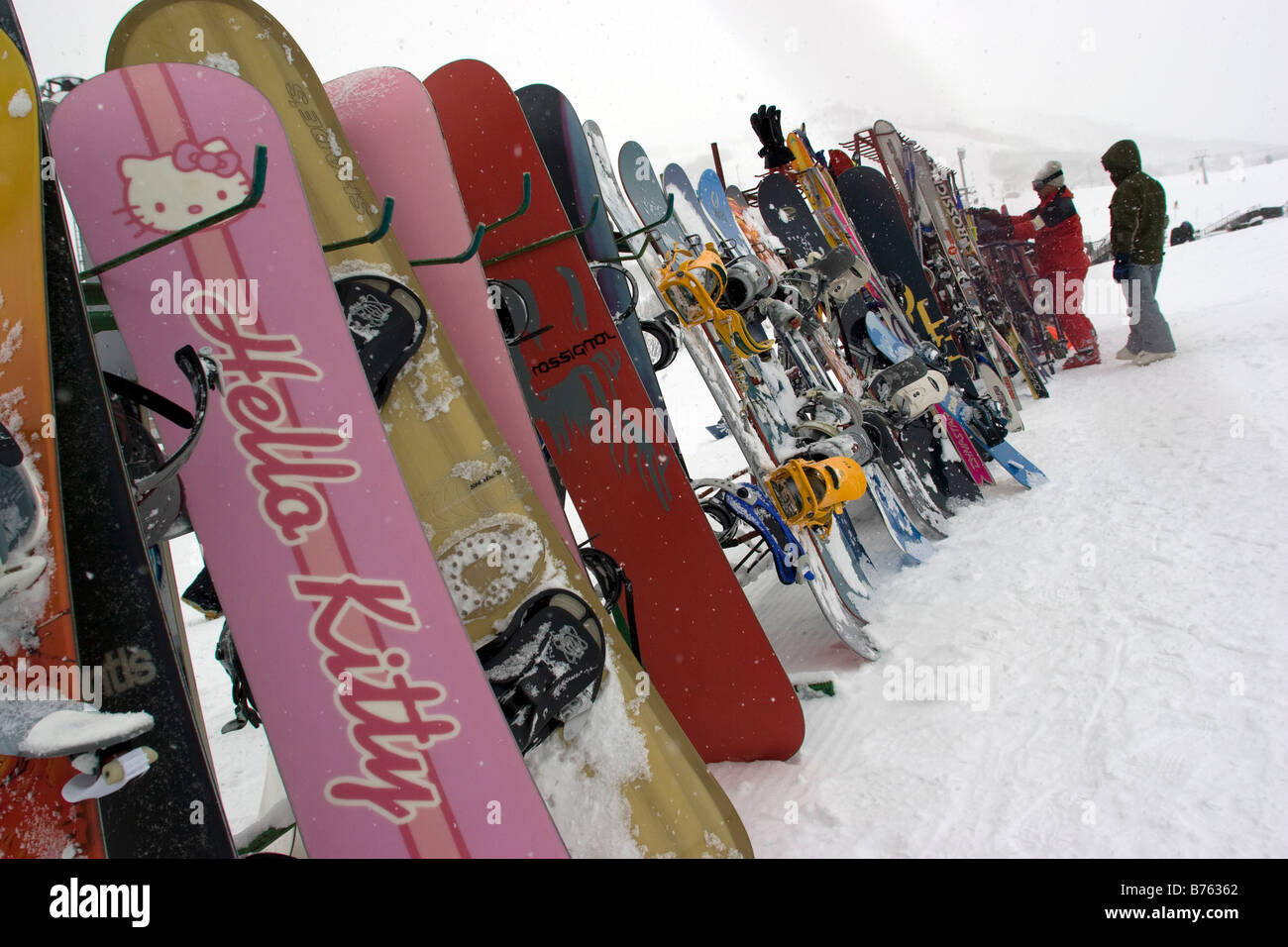 Snowboards lined up at the bottom of the run in Niseko, Japan Stock ...
