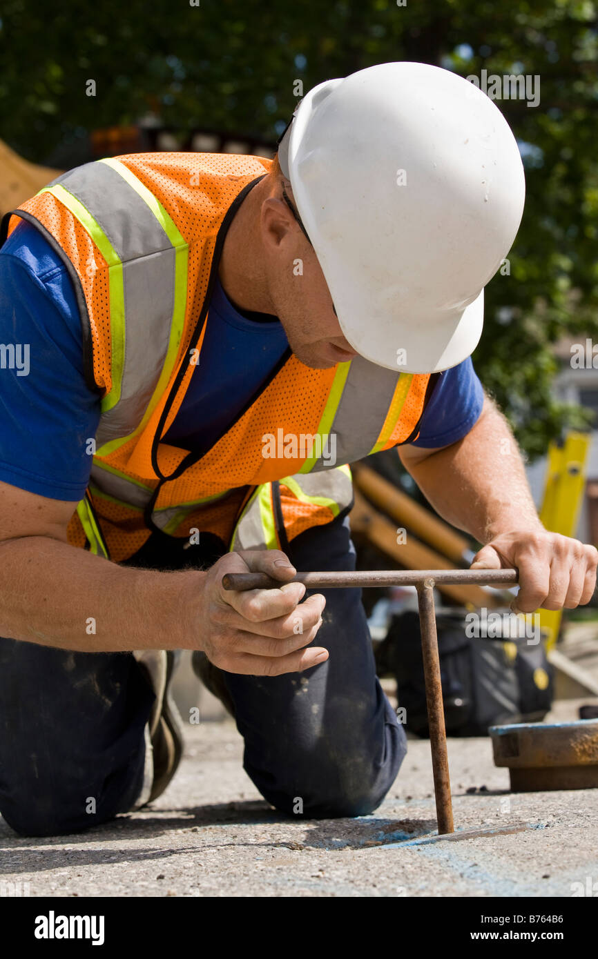 Worker on construction site Stock Photo - Alamy