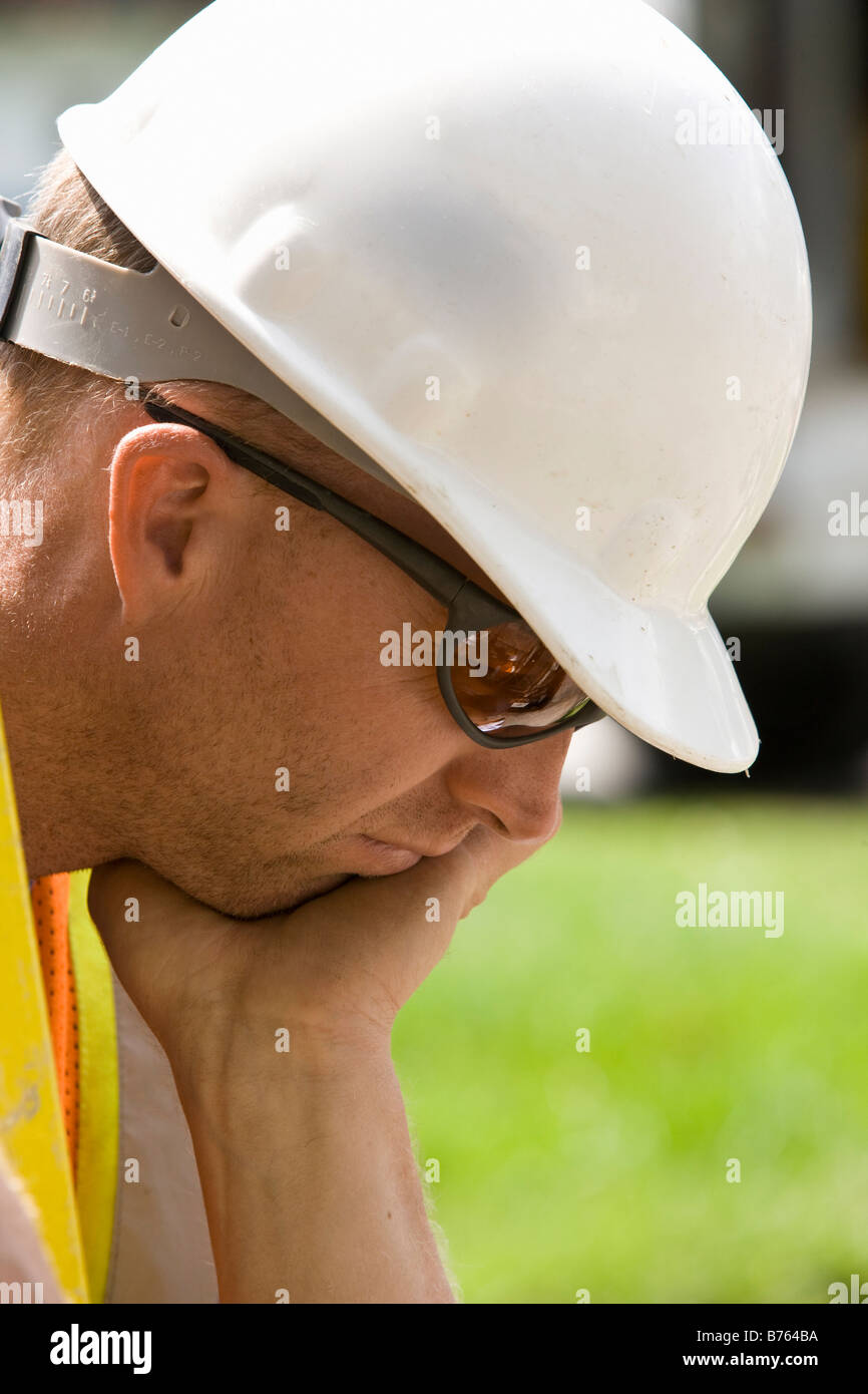 Tired construction worker, close-up Stock Photo - Alamy