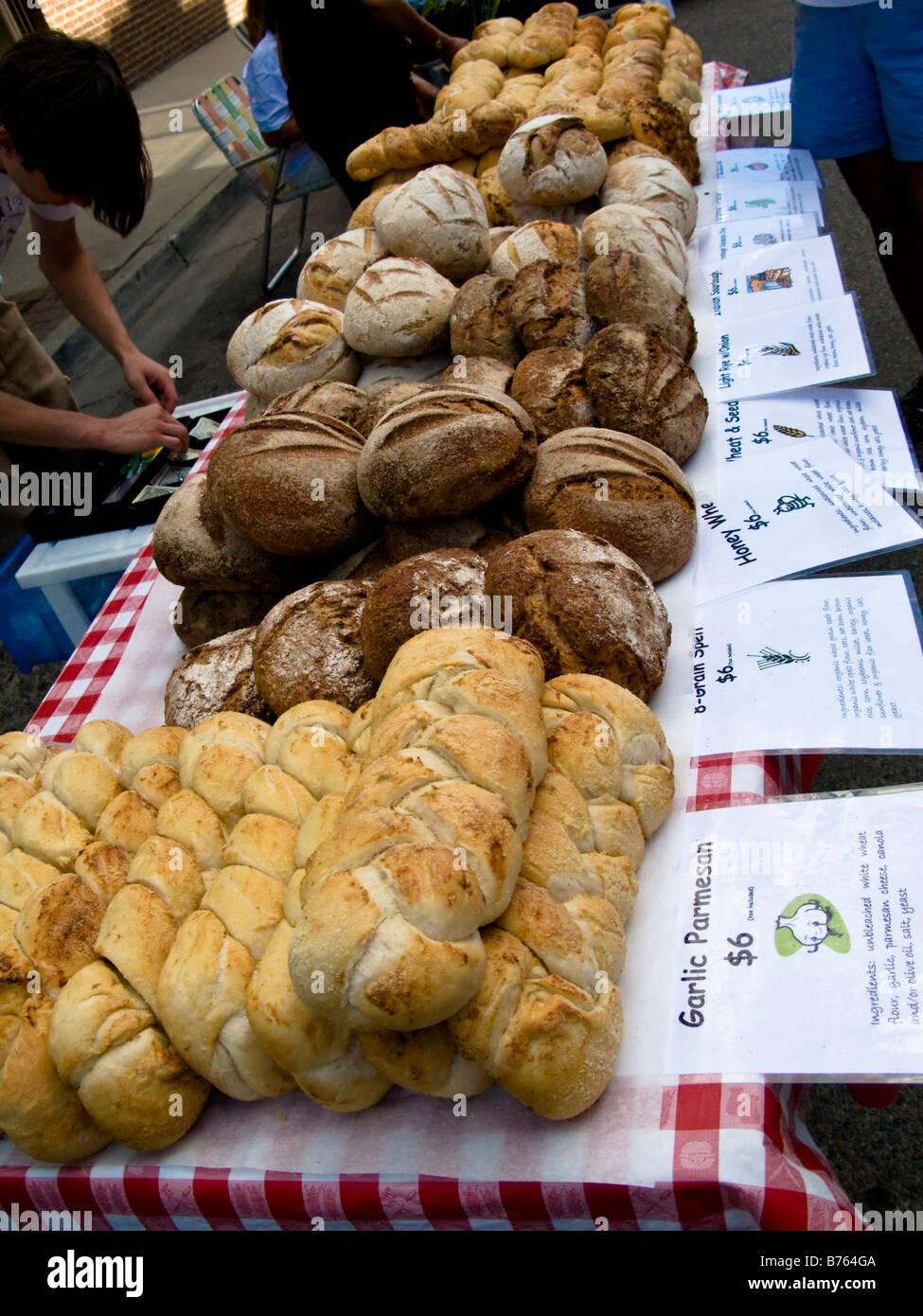 Variety of man-made bread on display in a local farmers market, USA ...