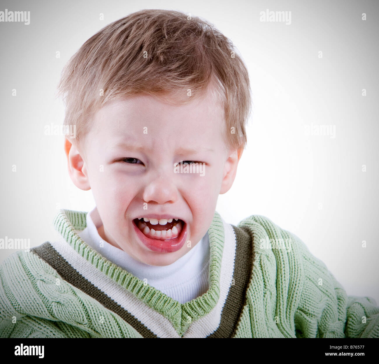 Young boy having a fit of anger portrait Stock Photo - Alamy