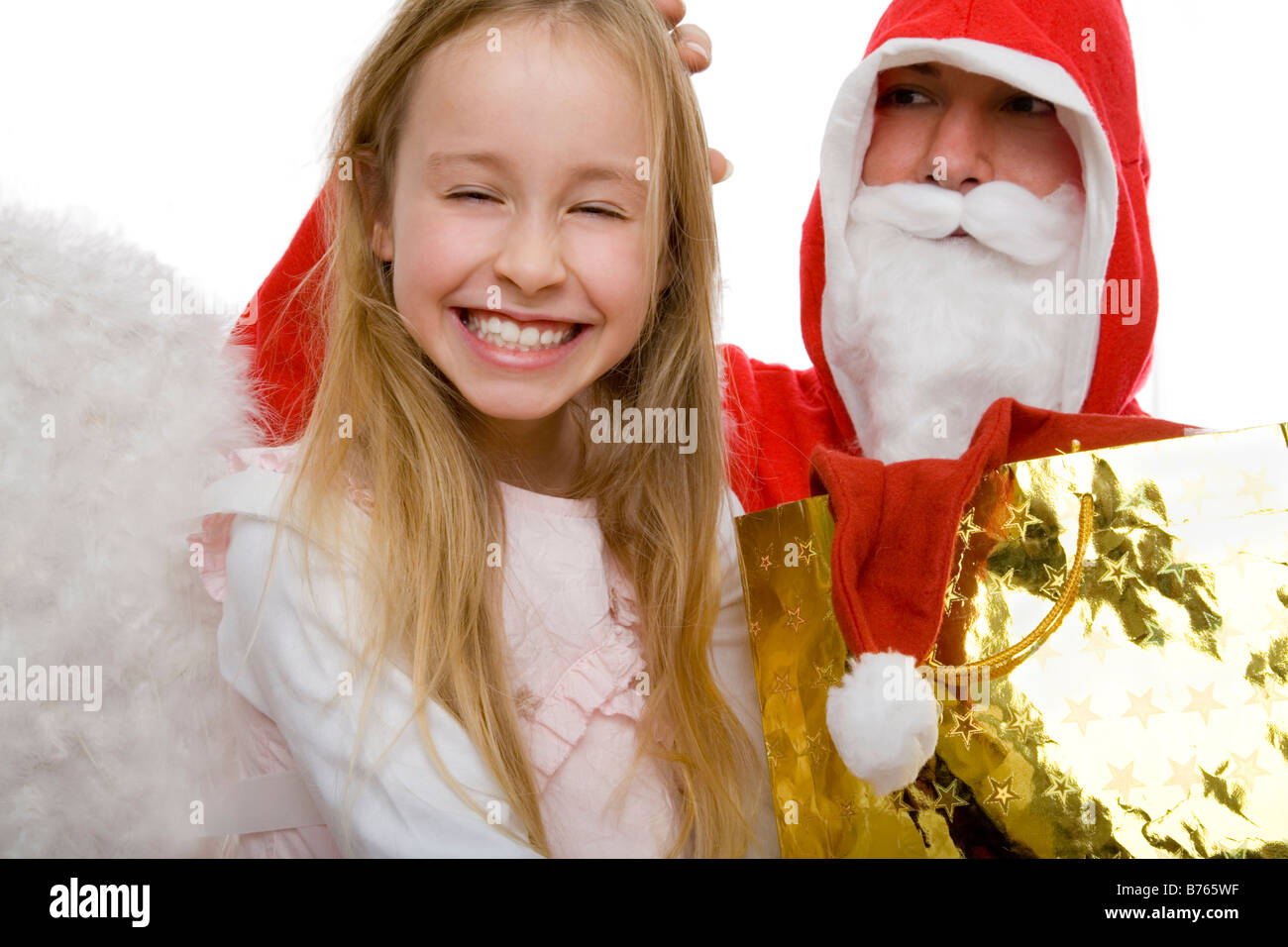 angel and santa claus Stock Photo - Alamy