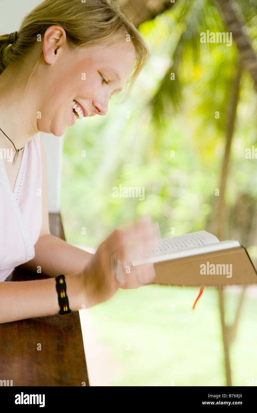 girl reading book Stock Photo - Alamy