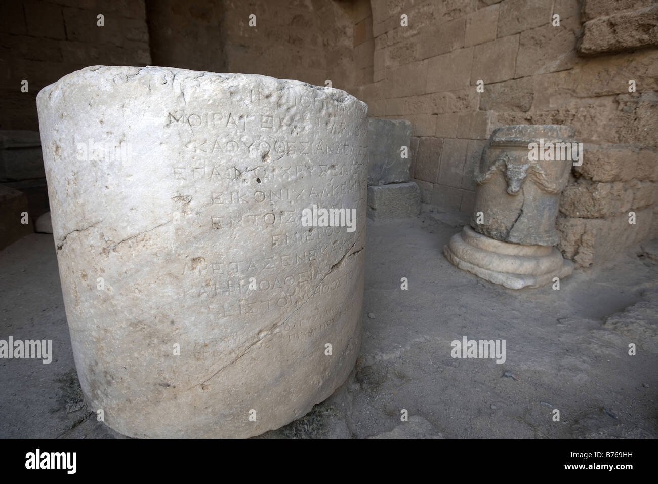 Scriptures and figures carved onto stone columns in the entrance to the ...