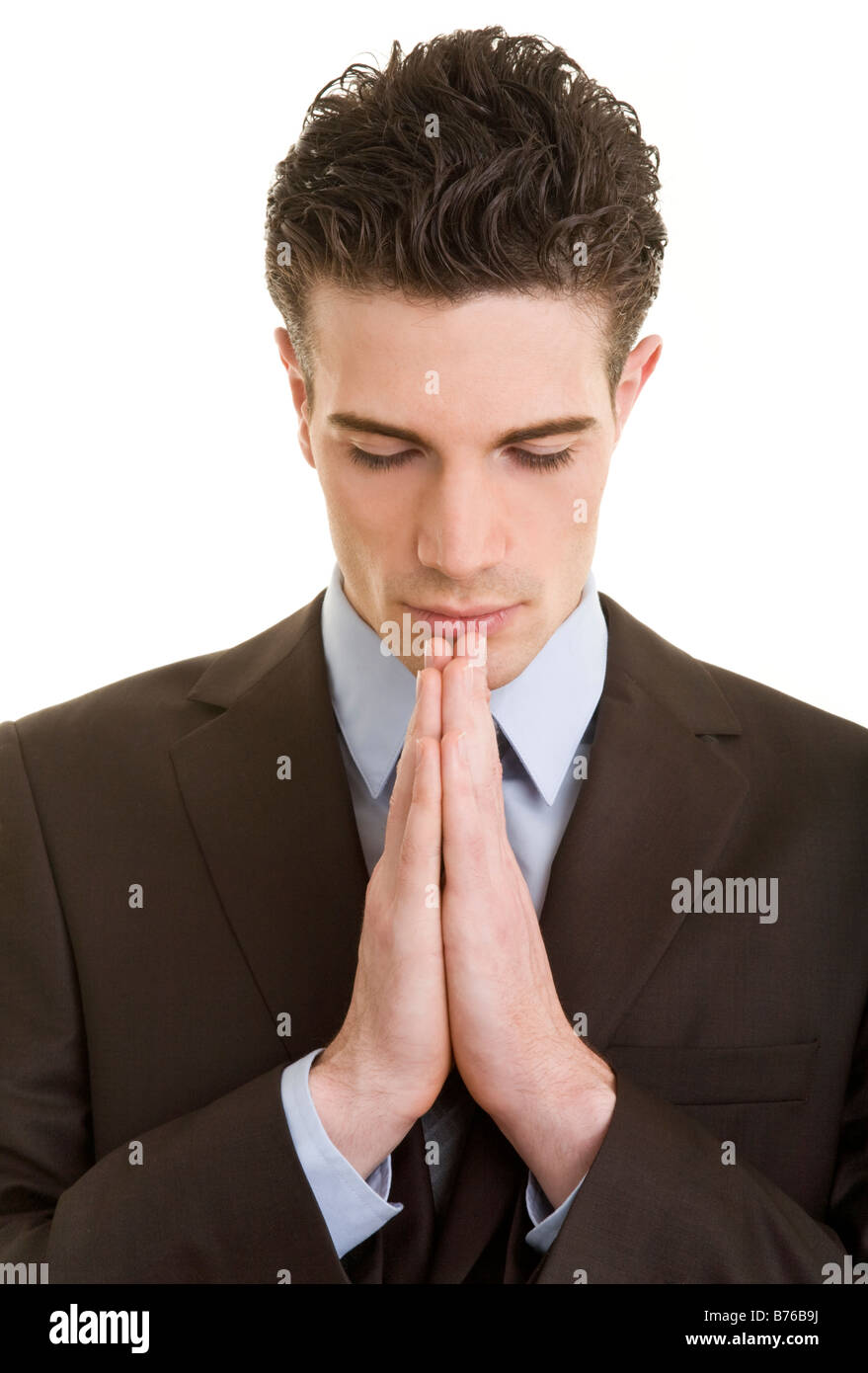 young man businessman pray praying hope ween Stock Photo - Alamy