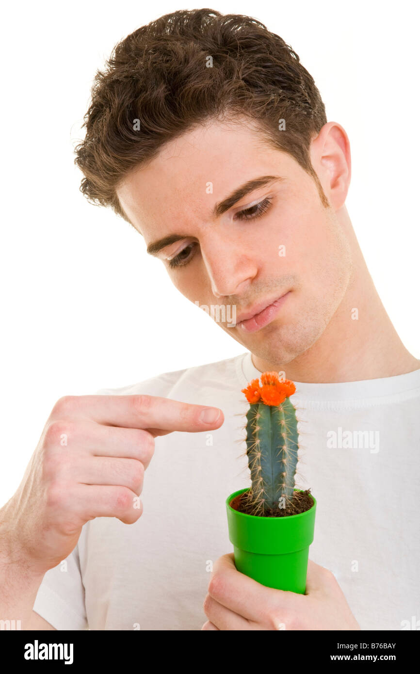 young man with cactus Stock Photo - Alamy