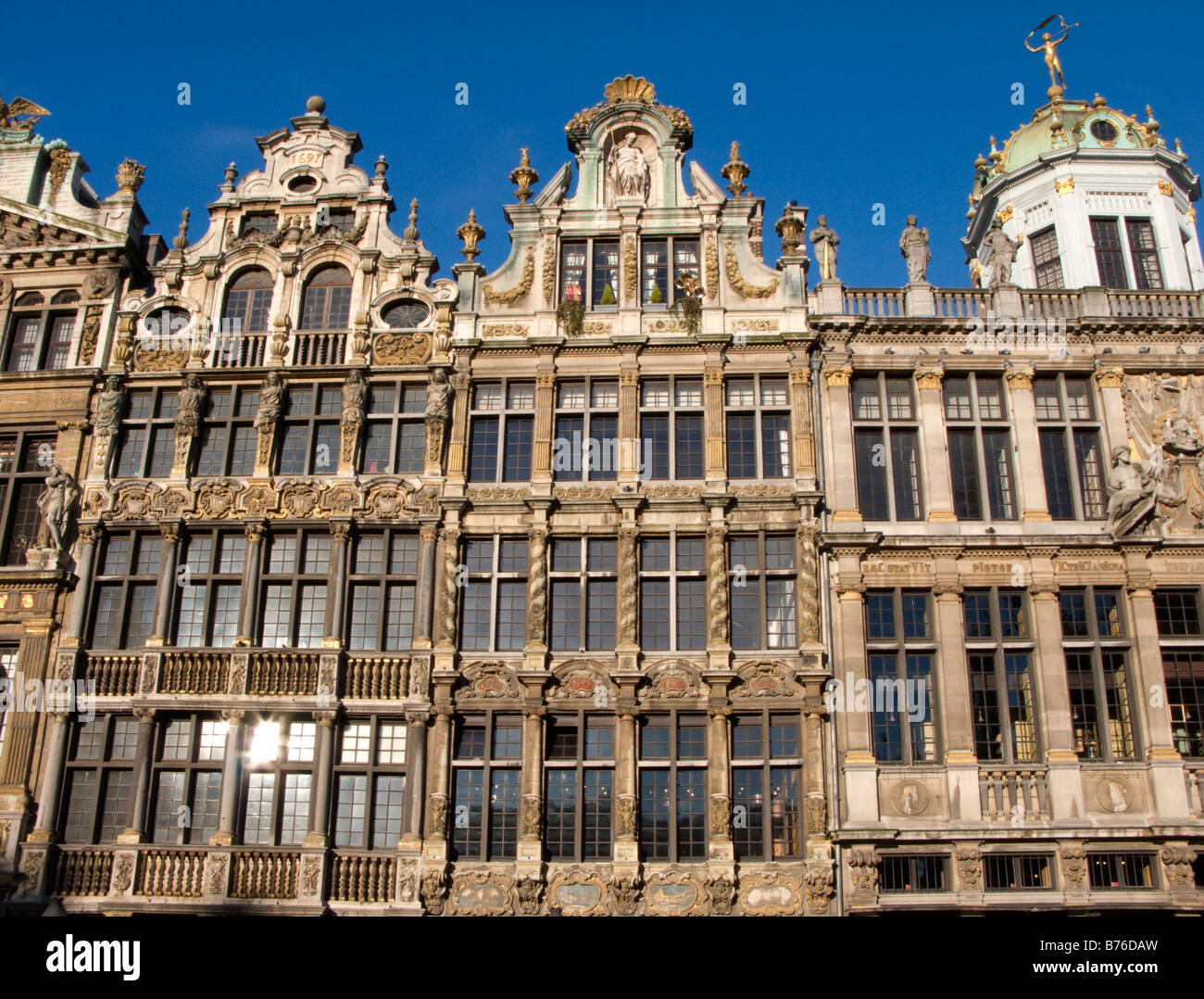 Facades of historic old buildings in famous Grand Place square Brussels ...