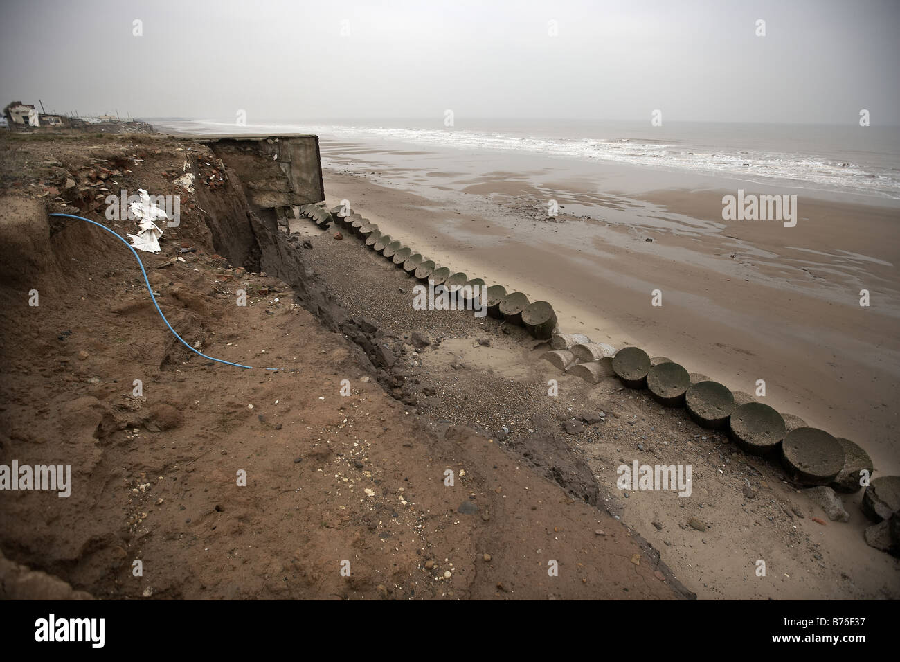Coastal Erosion Cliffs houses and road collapsing into the north sea at ...
