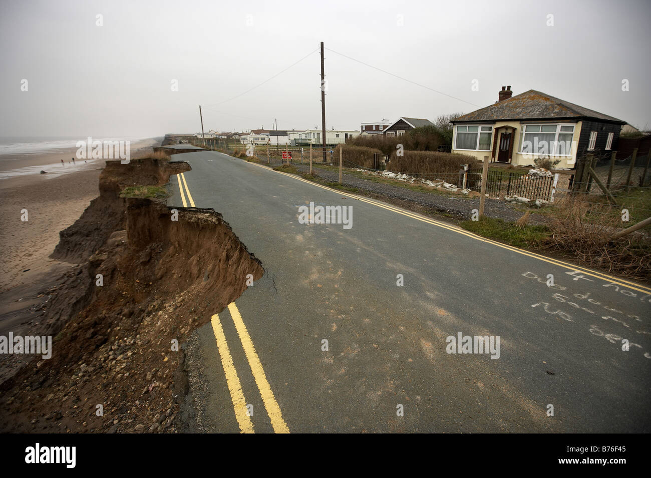 Coastal Erosion Cliffs houses and road collapsing into the north sea at ...