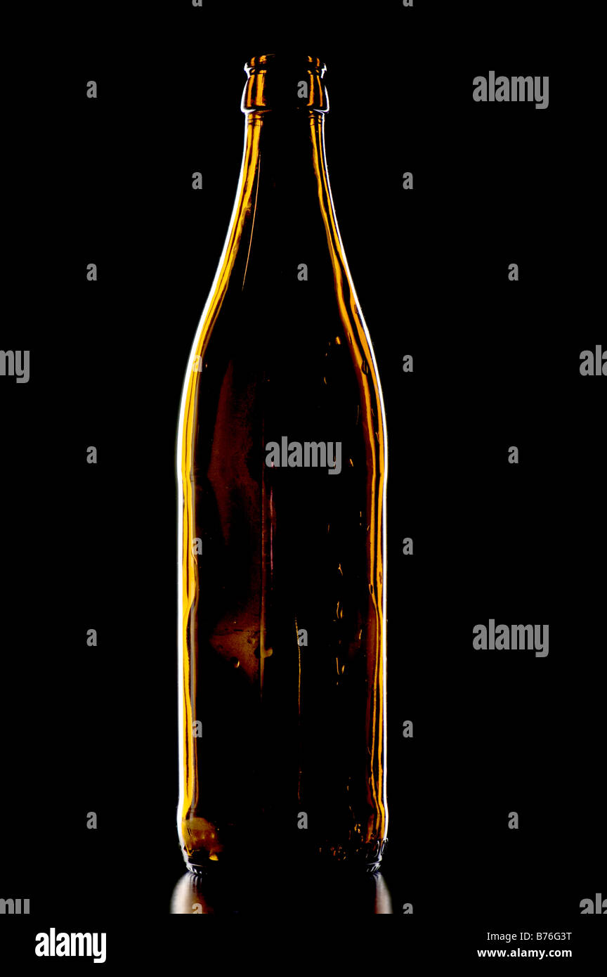object on black Empty beer bottle Stock Photo - Alamy