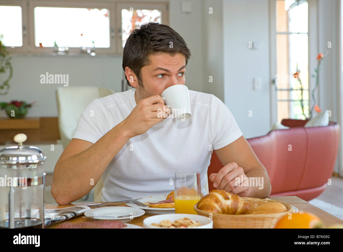 man having breakfast Stock Photo - Alamy