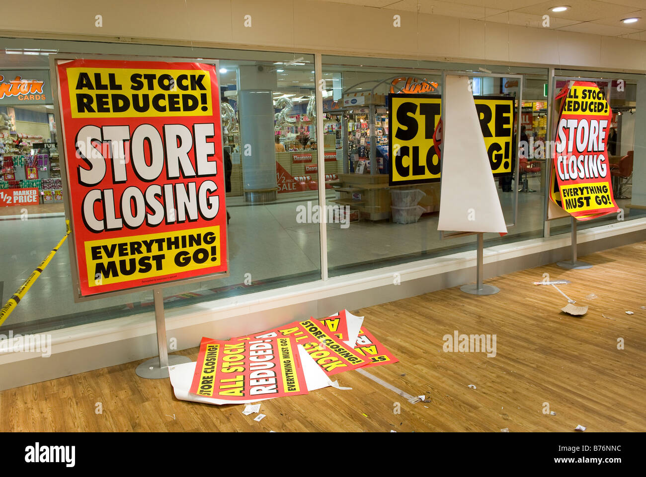 Store closing posters in the window of the Woolworths store in Redditch ...