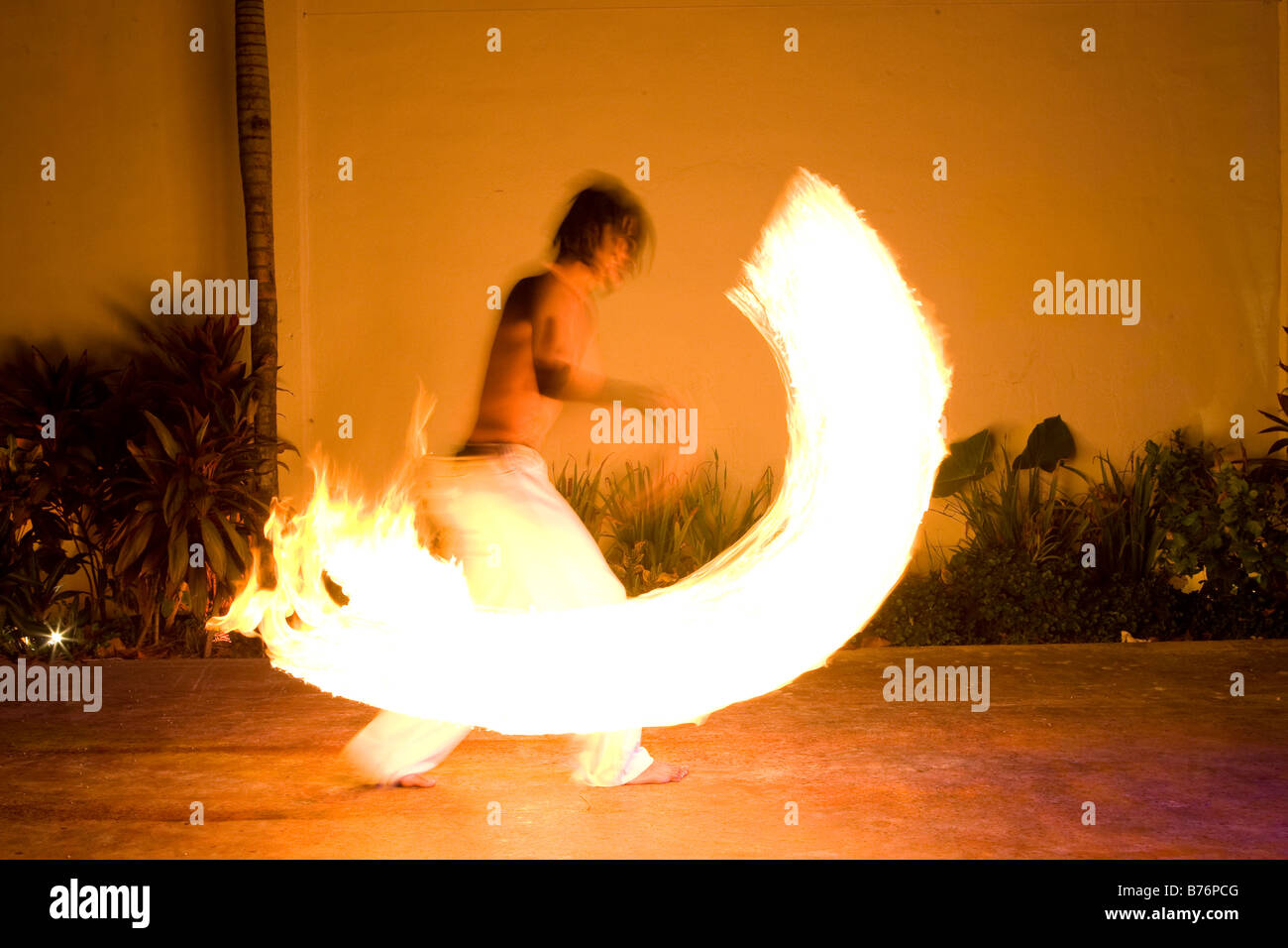 Fire Dancers putting on a show at night in Playa Del Carmen Mexico ...
