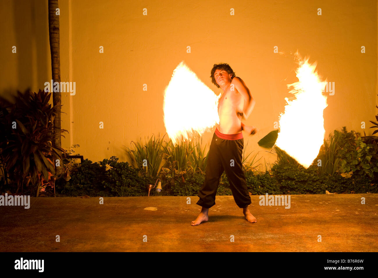 Fire Dancers putting on a show at night in Playa Del Carmen Mexico ...