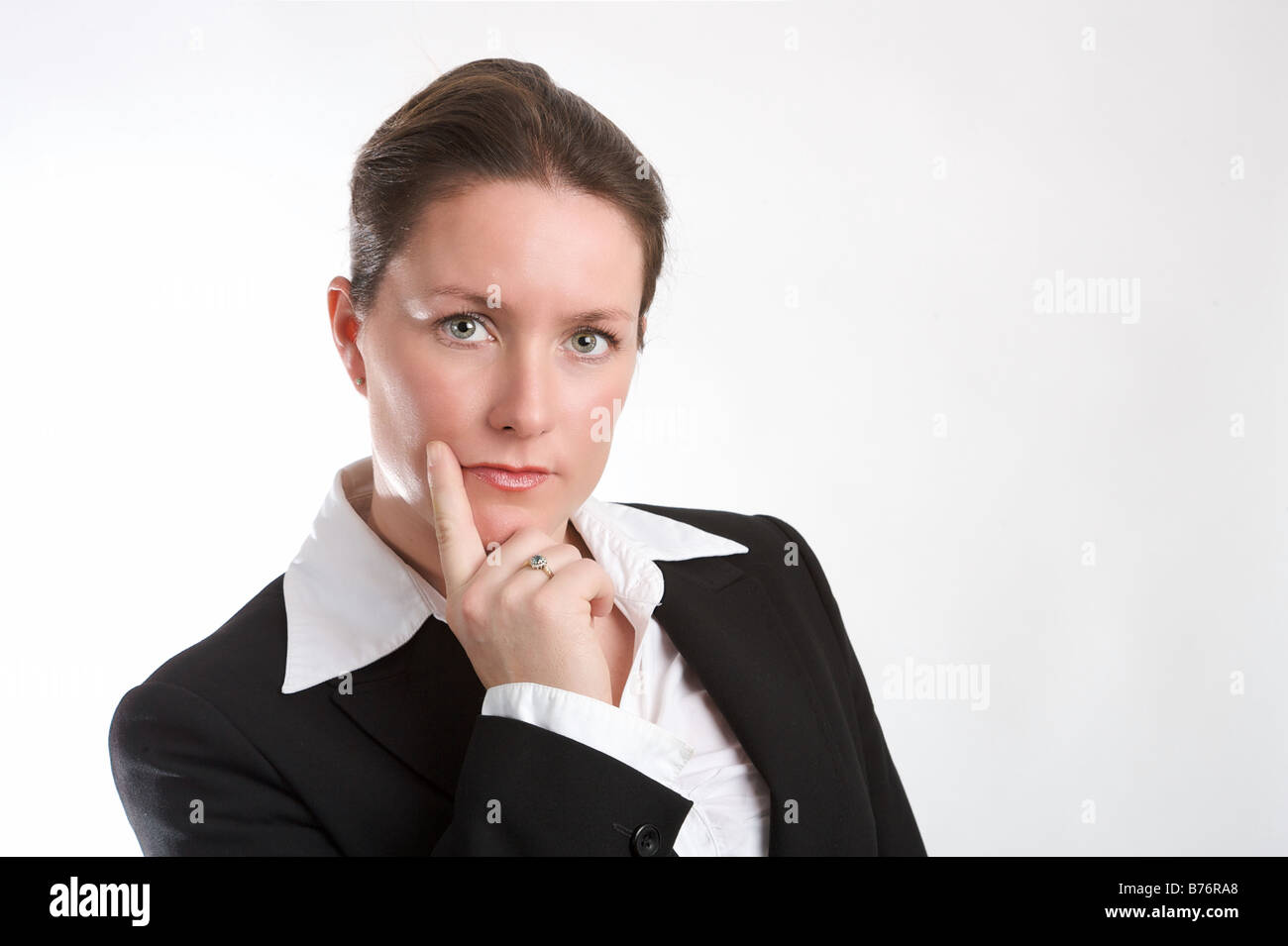 Young business woman thinking Stock Photo - Alamy