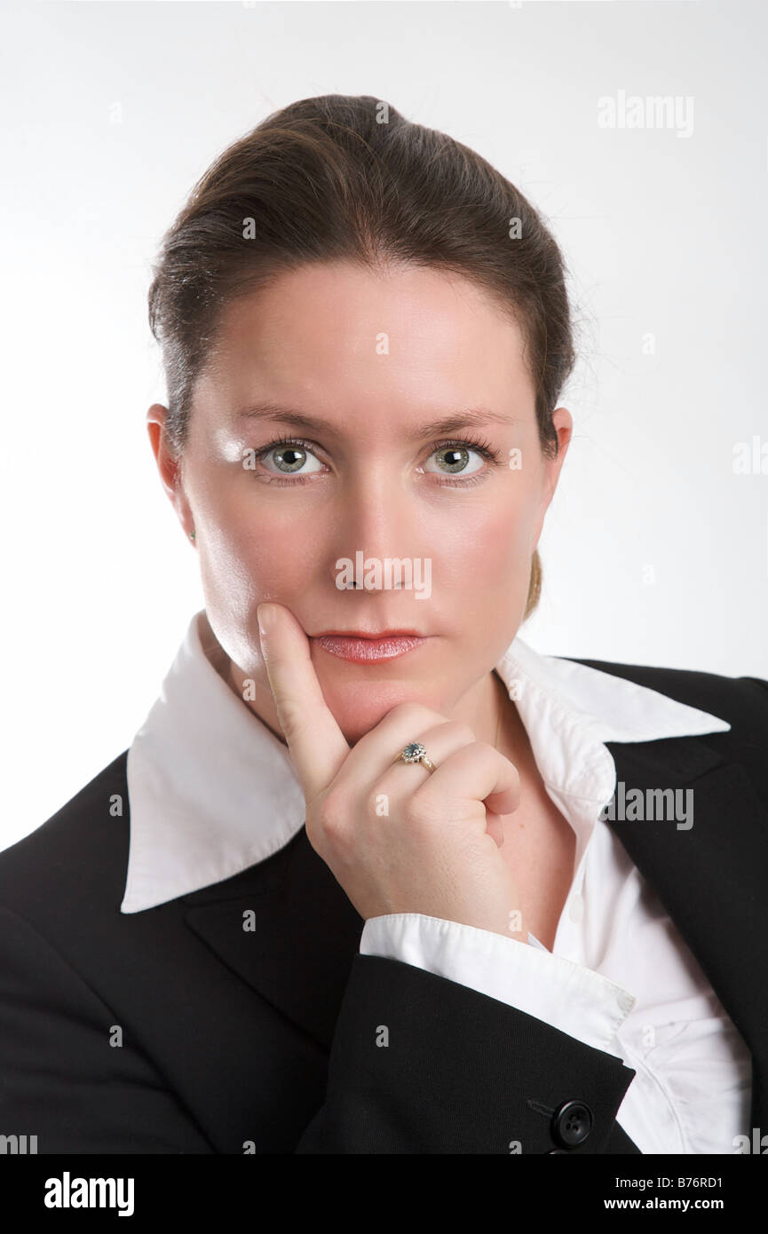 Young business woman thinking Stock Photo - Alamy