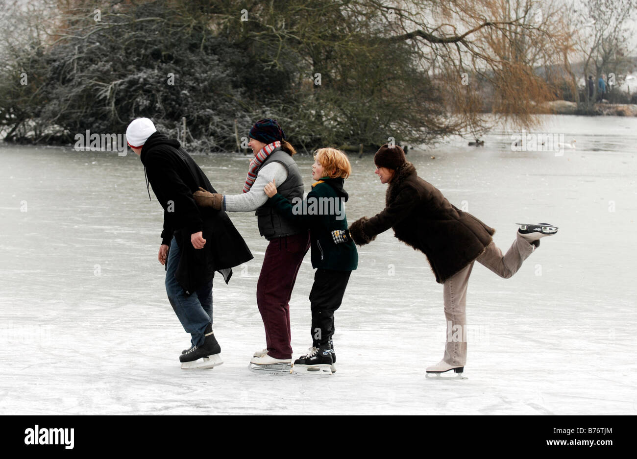 Families enjoy some fun on the ice at the frozen over Falmer pond near ...