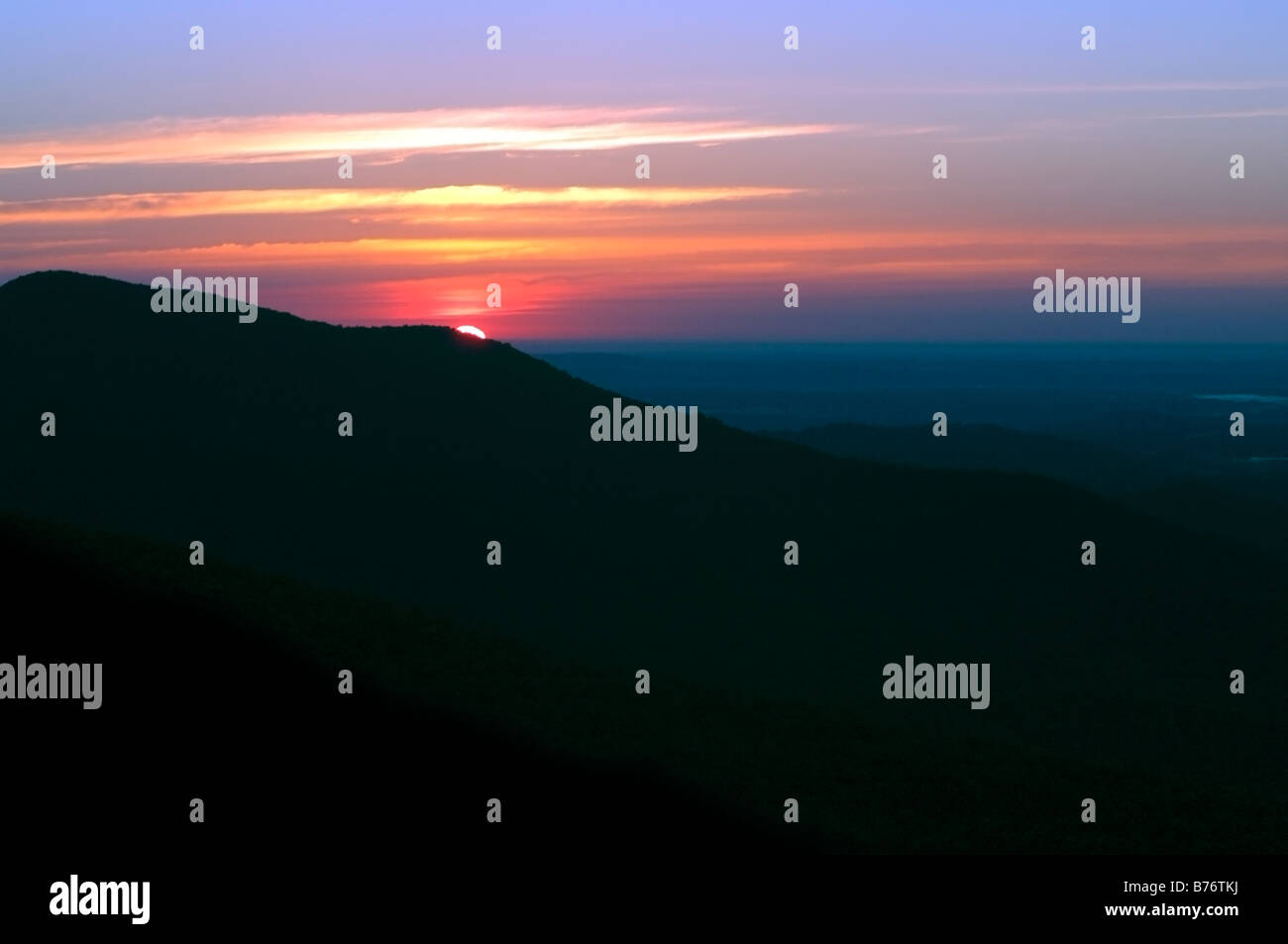 The sun rises over the Blue Ridge Mountains on Skyline Drive, George ...