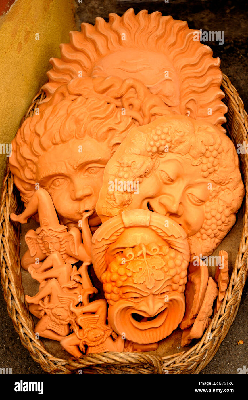 Typical terracotta items usually hung on walls of houses in Taormina ...