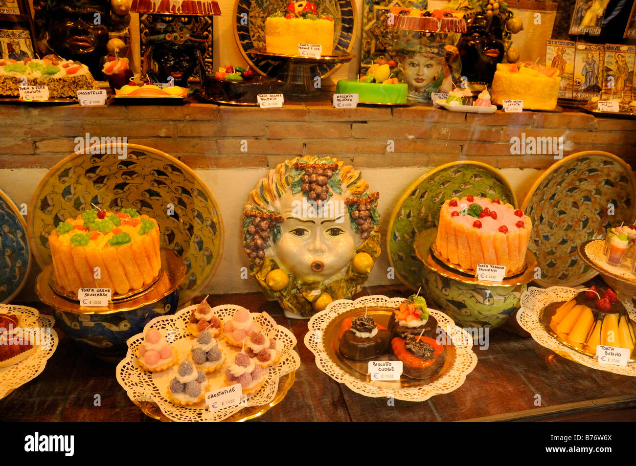 Typical Sicilian candle and wax Items on sale in shop in Taormina in ...