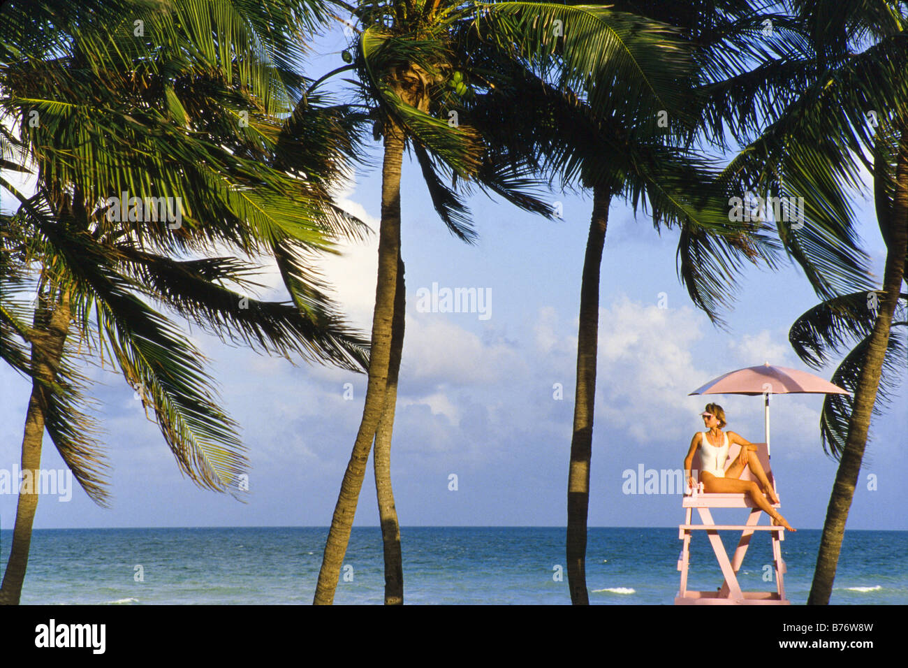 Female Lifeguard, at beach, sitting in lifeguard chair, South Beach ...