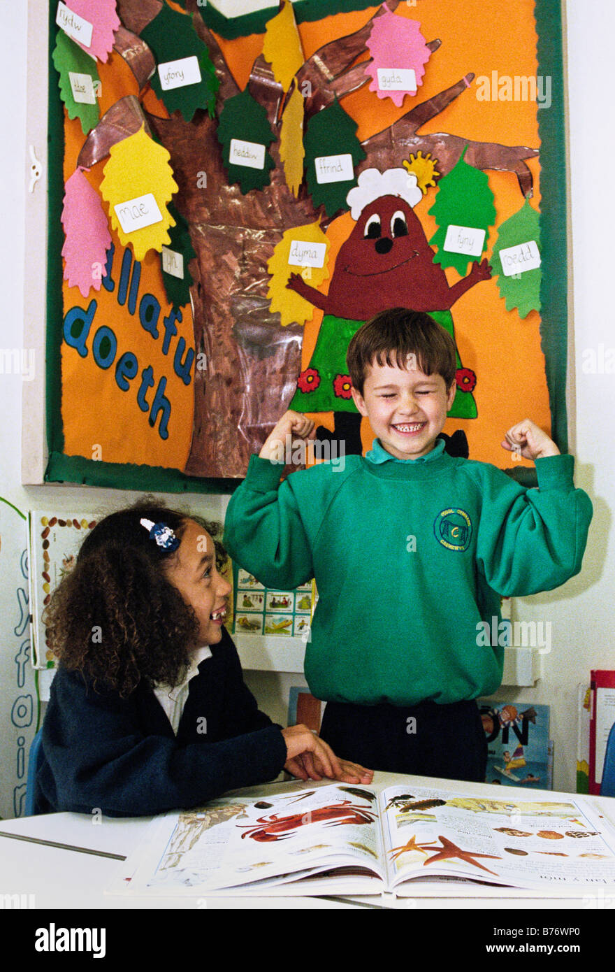 Pupils working in classroom at Welsh language junior school in Newport ...
