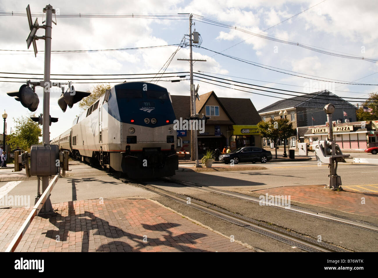 Amtrak Downeaster Passenger train crosses grade crossing at Old Orchard ...