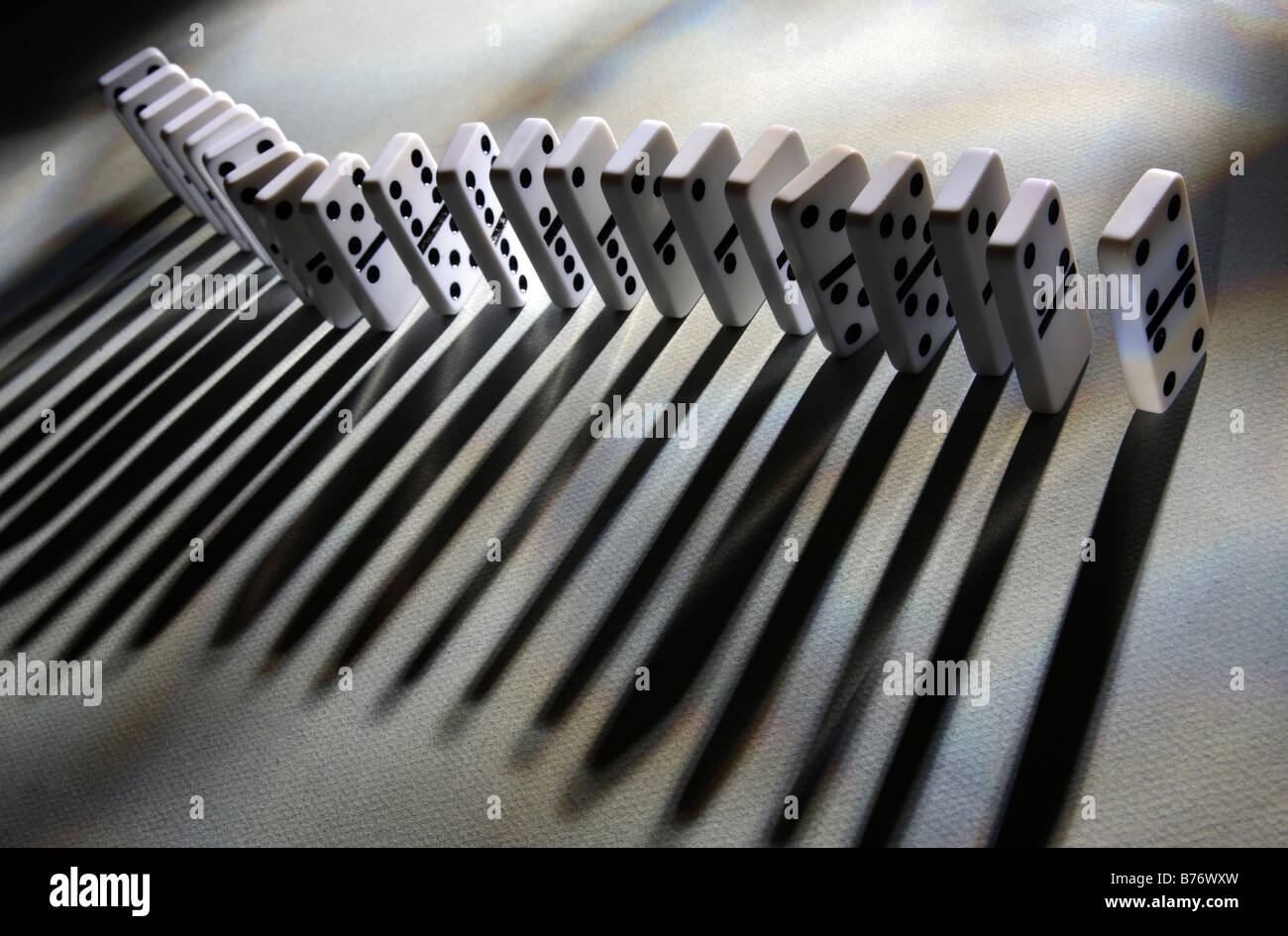 A line of dominoes Stock Photo - Alamy