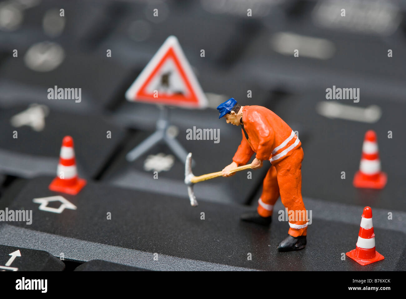 Works figures working hi-res stock photography and images - Alamy