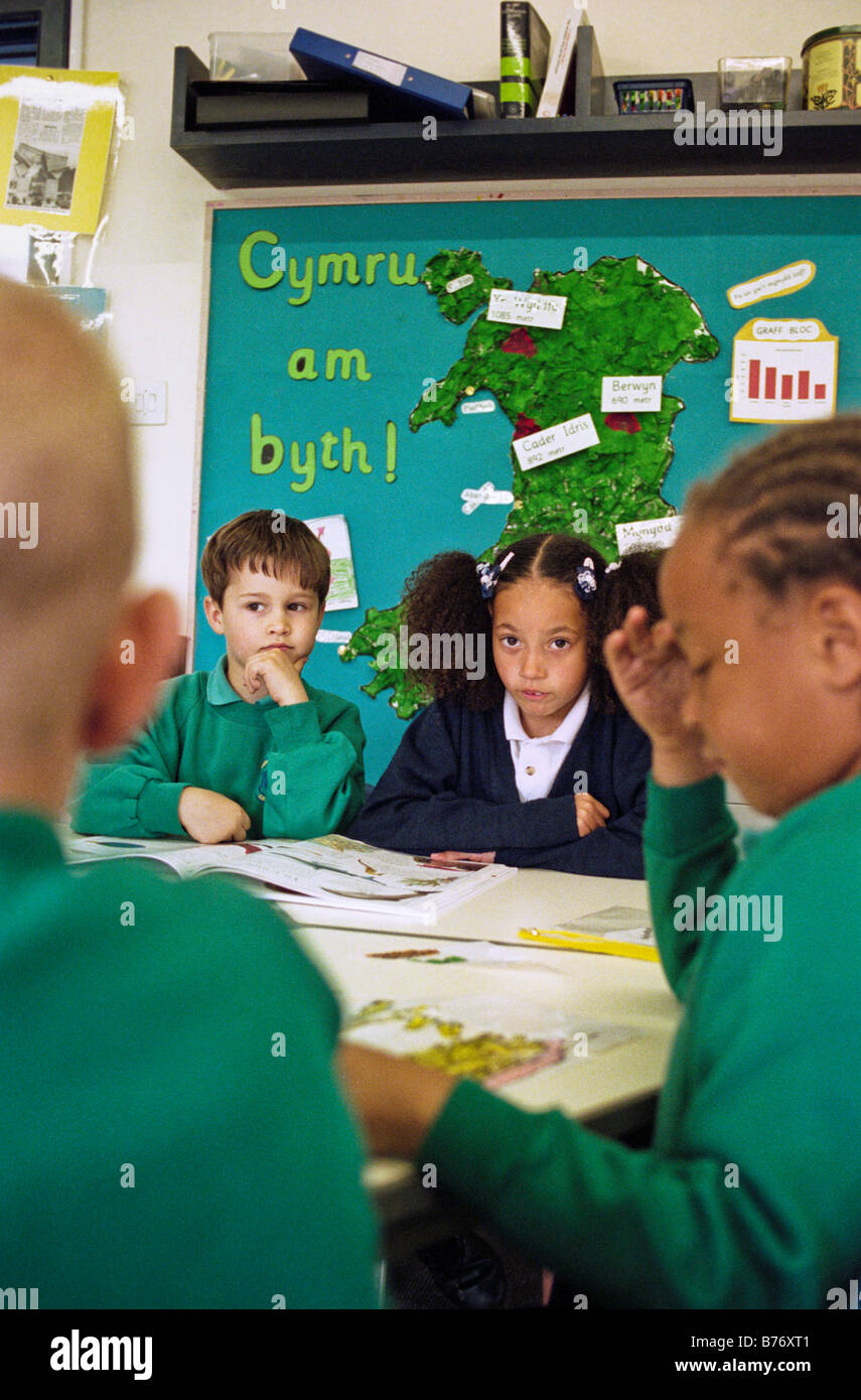 Pupils working in classroom at Welsh language junior school in Newport ...