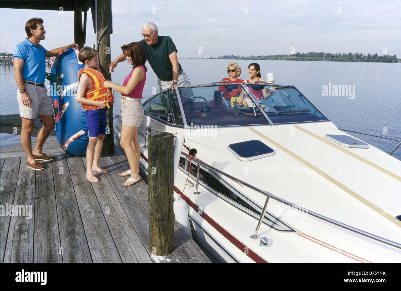 Grandparent, parents ,and kids boating together, Miami Stock Photo - Alamy