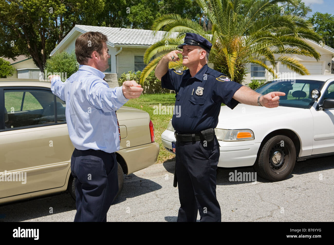 Police officer demonstrating a field sobriety test to a motorist Stock ...