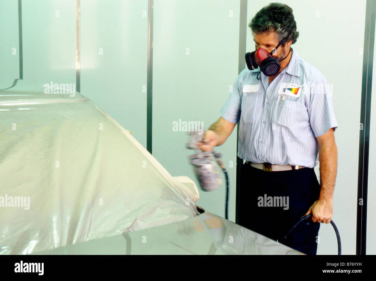 Auto Body Spray Painter in Dust-free Booth Stock Photo - Alamy