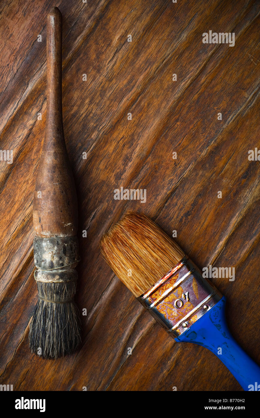 two brushes on wood surface Stock Photo - Alamy