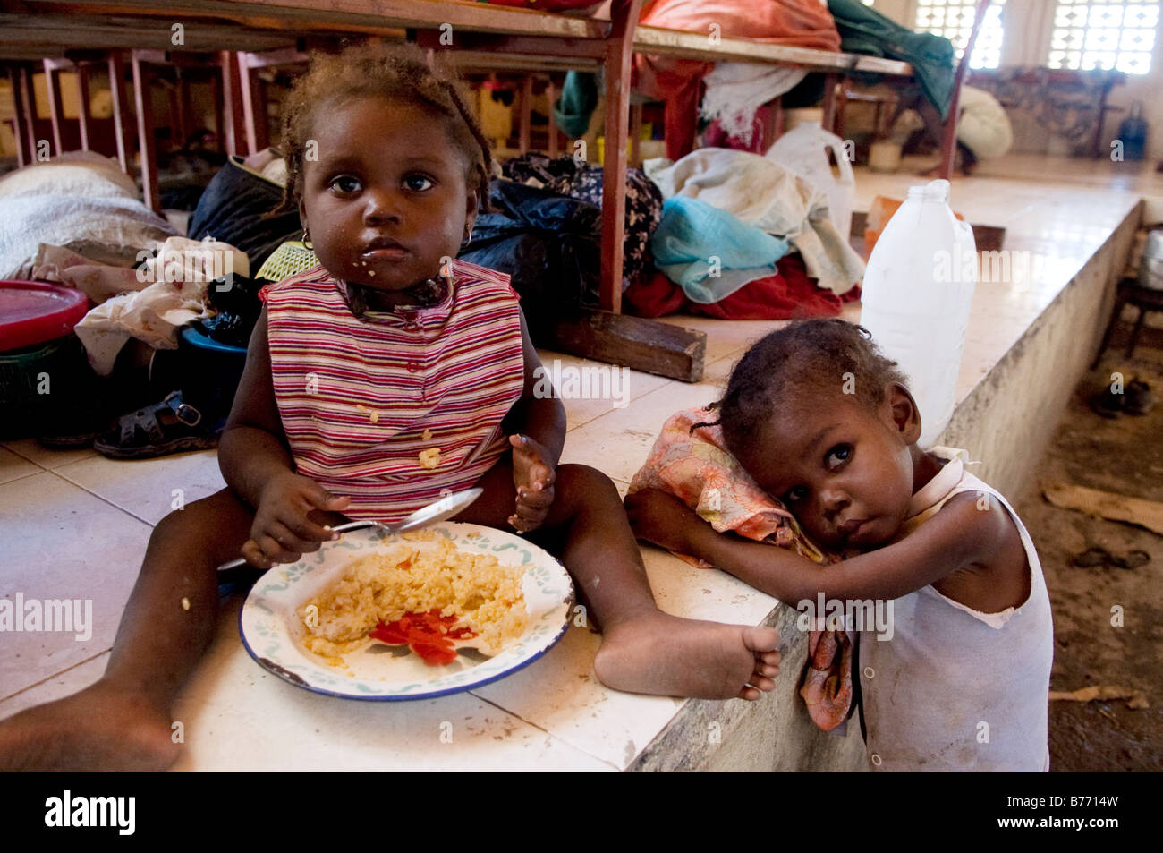 Homeless Haitian in the evacuation centre in Gonaives after three ...