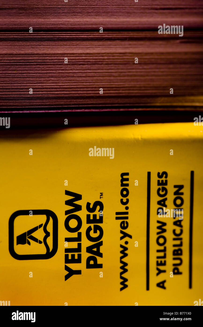Yellow Pages telephone directory in cabinet close up Stock Photo - Alamy
