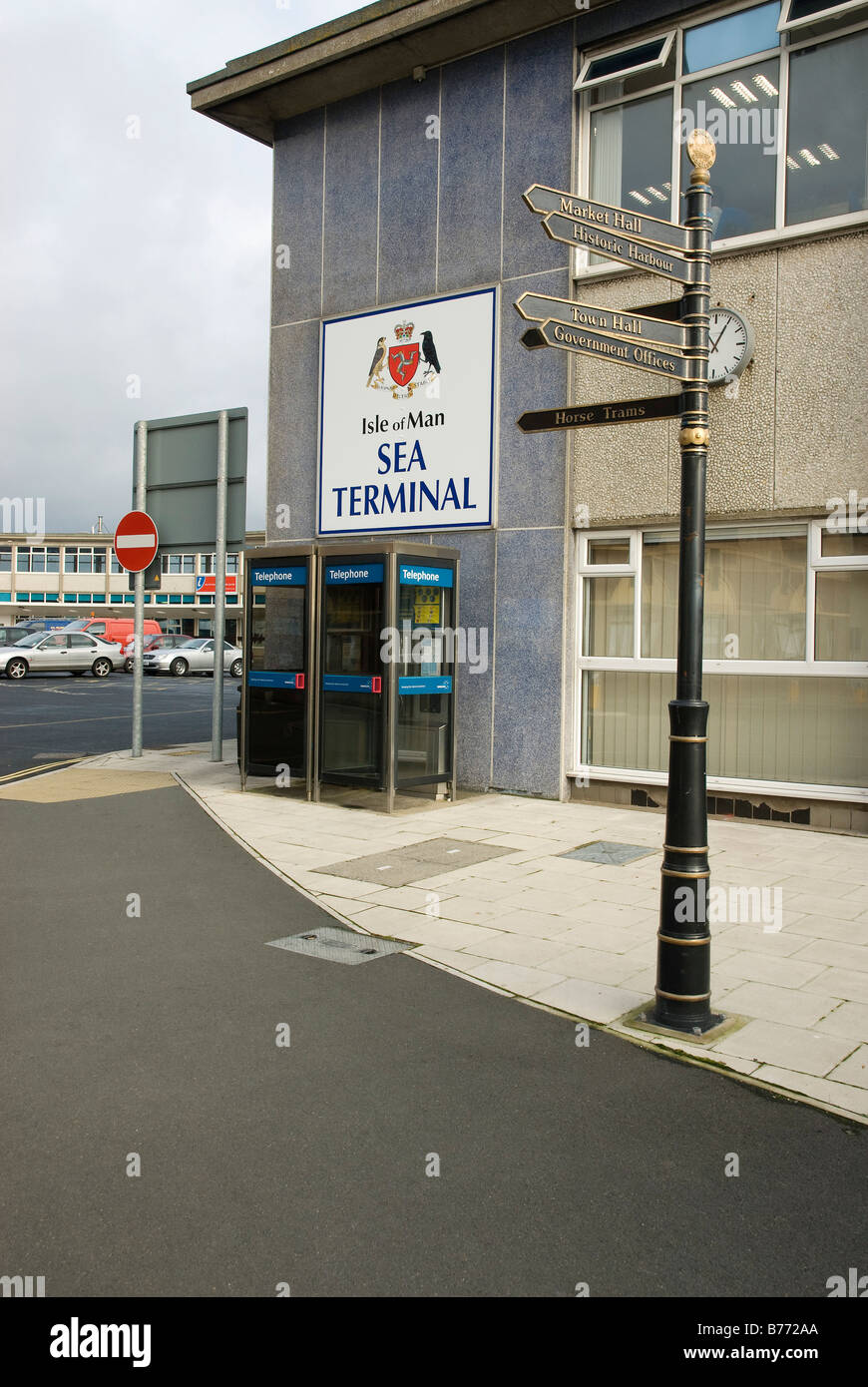 Sea terminal in Douglas, Isle of Man plus phone box and sign Stock ...