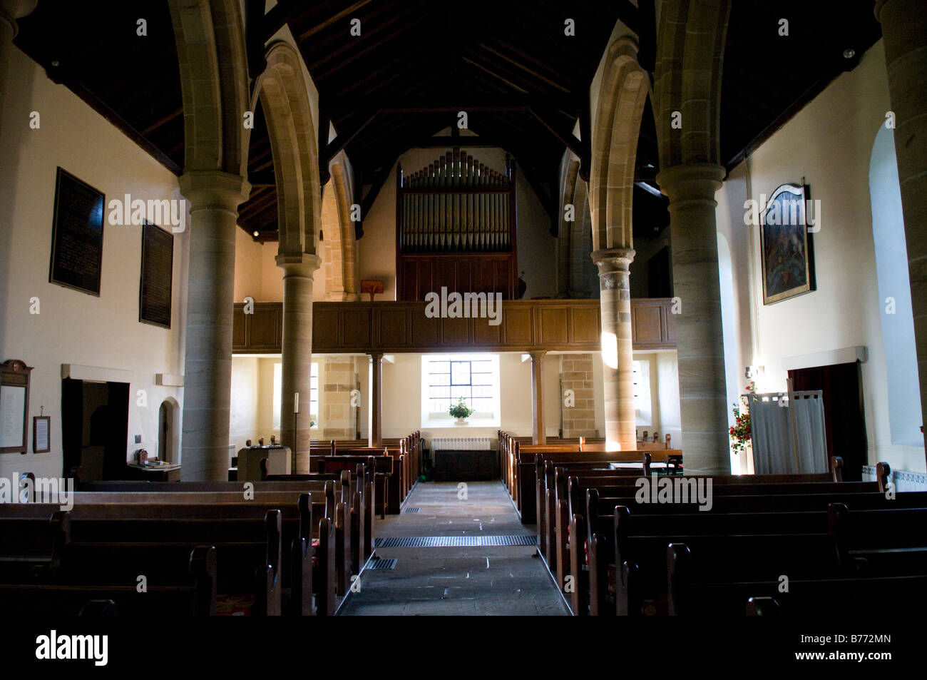 Beautiful church with oak pulpits, stained glass windows and pillows ...